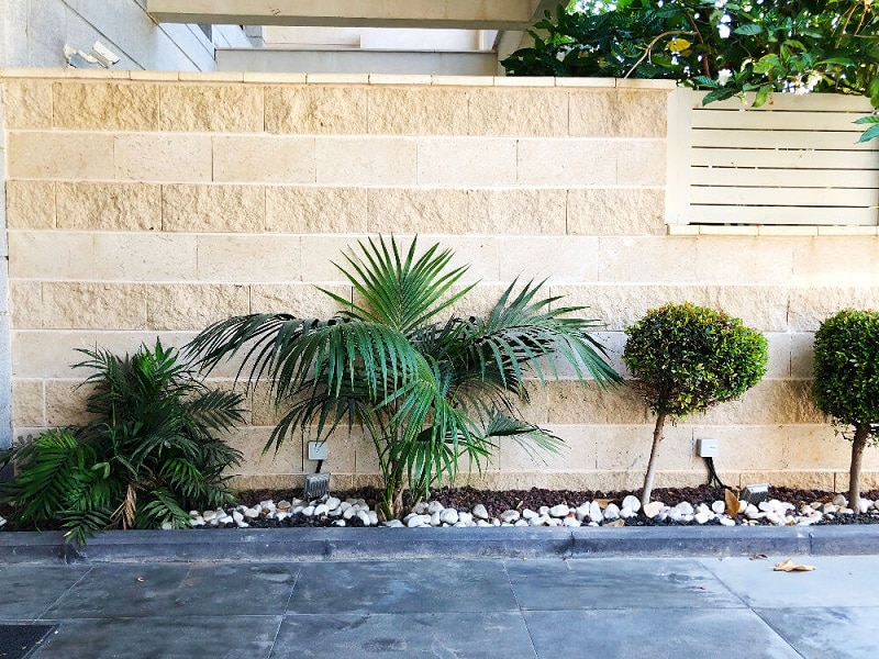 Les règles à connaître pour fixer des éléments sur un mur mitoyen - Mon Conseiller Immo